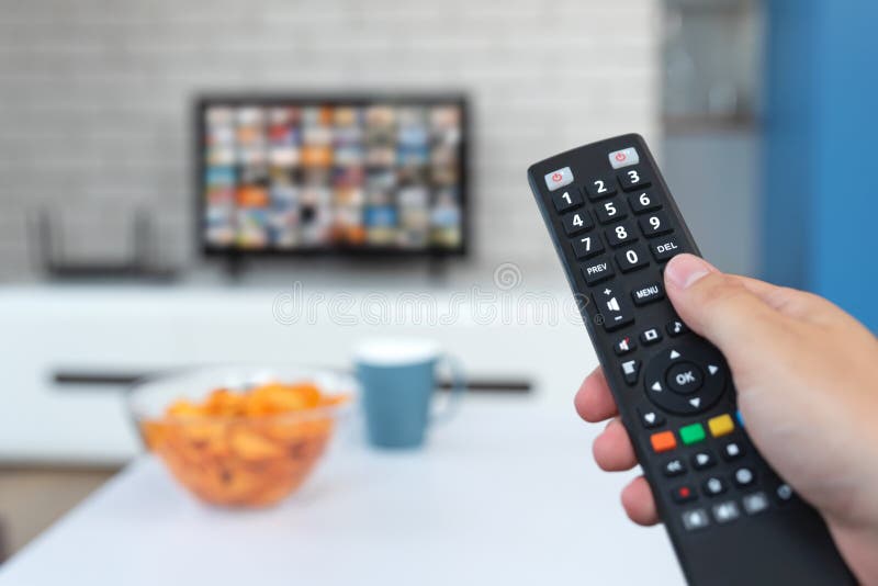 Man Watching TV, Remote Control in Hand Stock Image - Image of holding ...