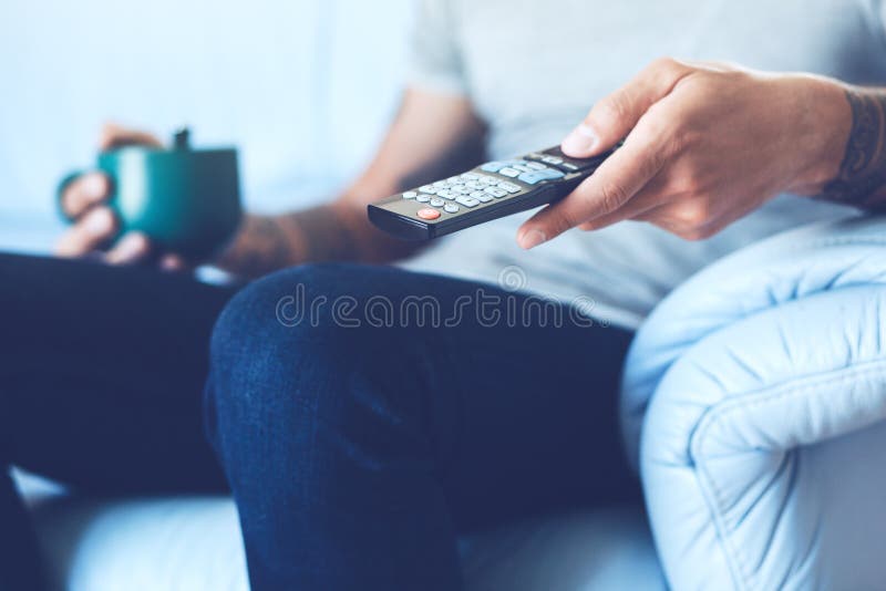 Man Watching Tv with Remote Control Stock Photo - Image of holding ...