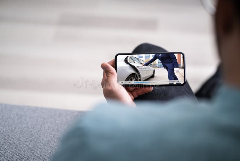 Man Watching Video on Mobile Phone Stock Photo - Image of background ...