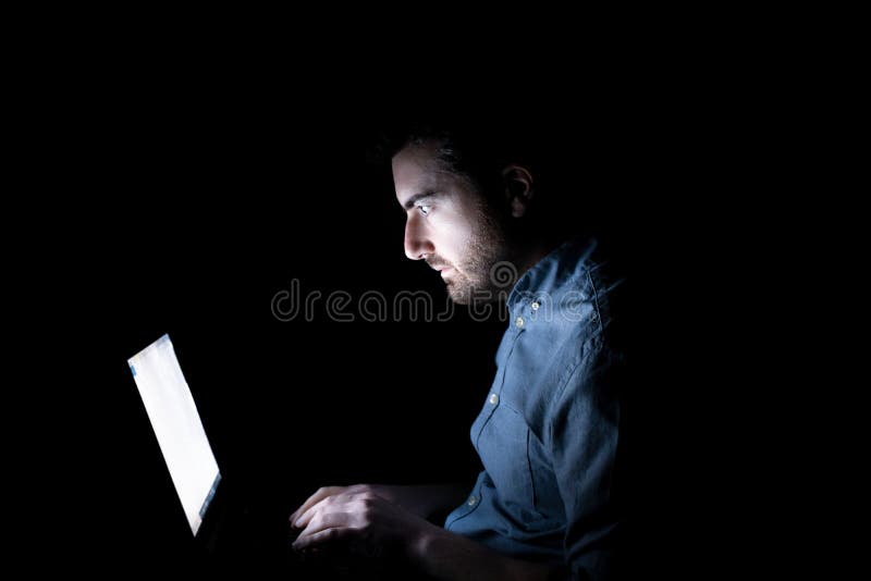 One Man Working Alone at Night Using Notebook Stock Image - Image of ...
