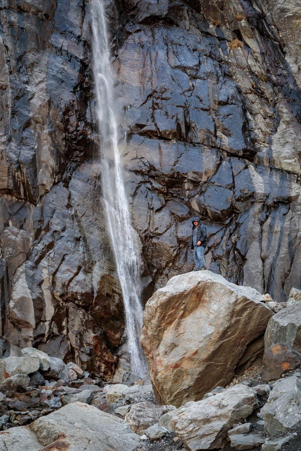 Man at Waterfall in the Mountains Stock Photo - Image of nature ...