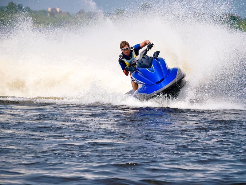 Man on Wave Runner on the Water Stock Image - Image of speed, jetski ...