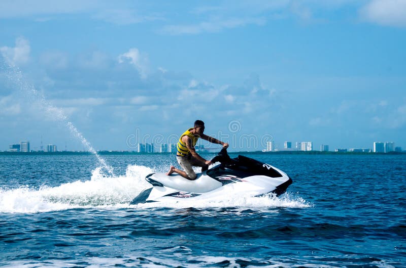 Man on a Waverunner on the Caribbean Sea Editorial Image - Image of ...