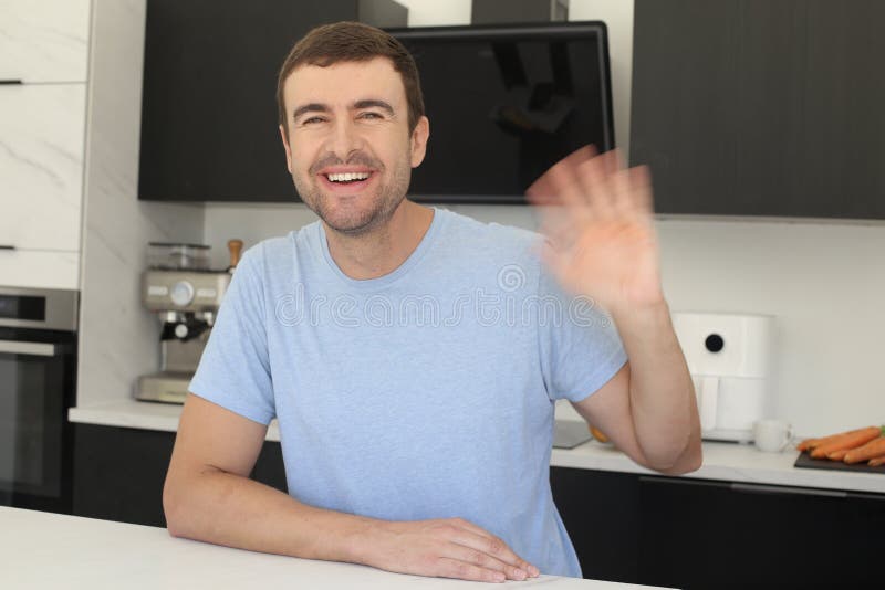 Man Waving His Hand in the Kitchen Stock Photo - Image of glad ...