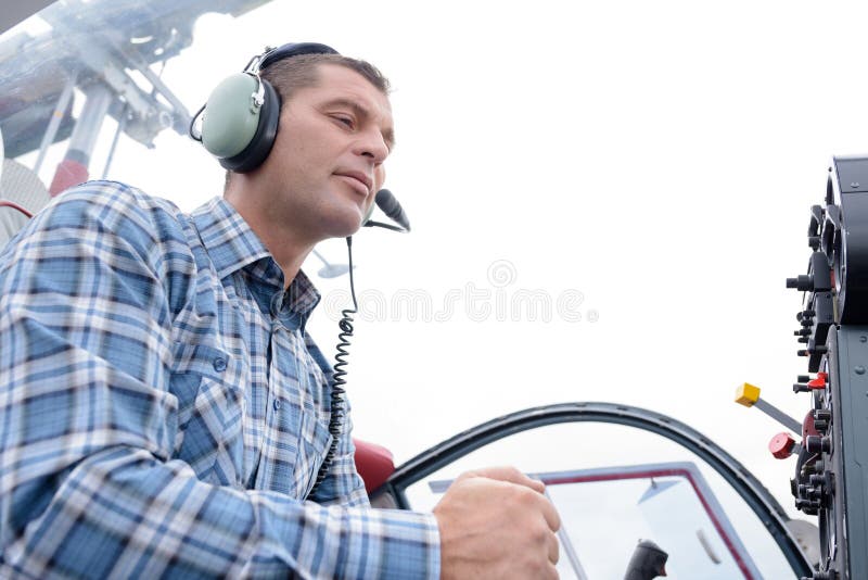 Man Wearing Aviation Headset by Control Panel Stock Image - Image of ...