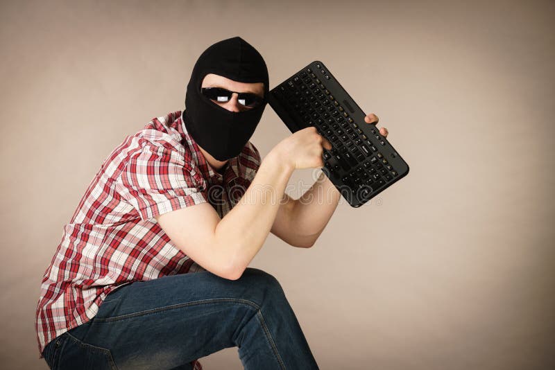 Man Wearing Balaclava Holding Keyboard Stock Image - Image of hacker ...