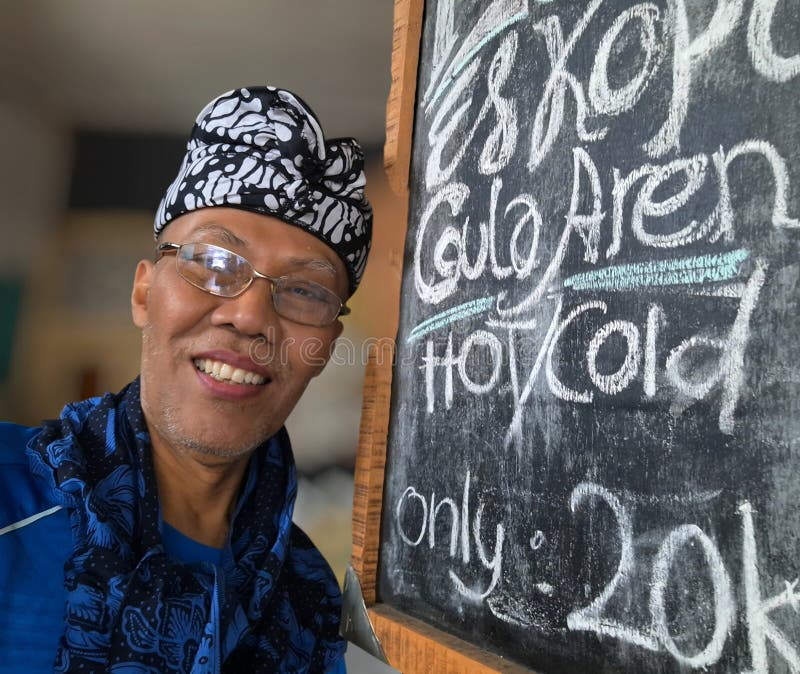 A Man Wearing Batik and Traditional Java Stock Image - Image of black ...