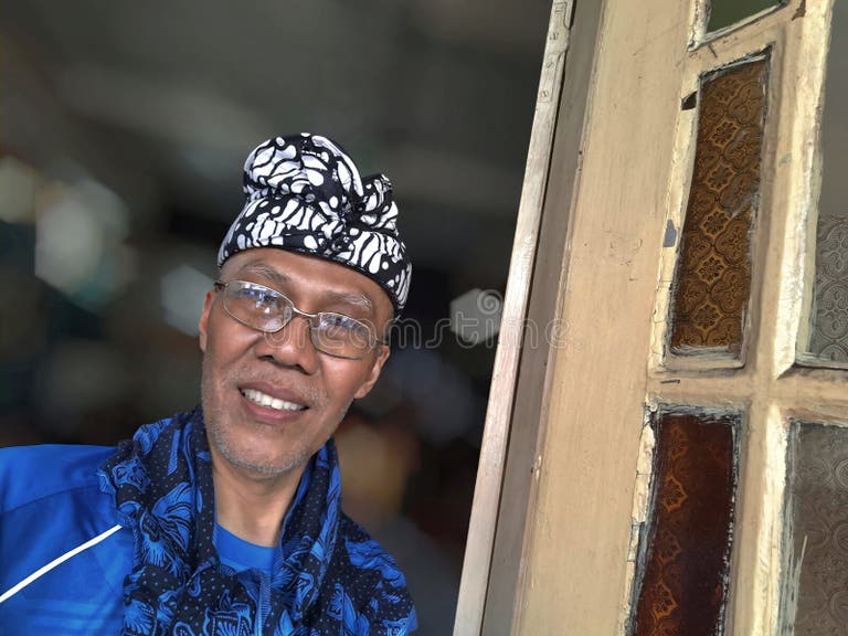 A Man Wearing Batik and Traditional Java Stock Photo - Image of temple ...