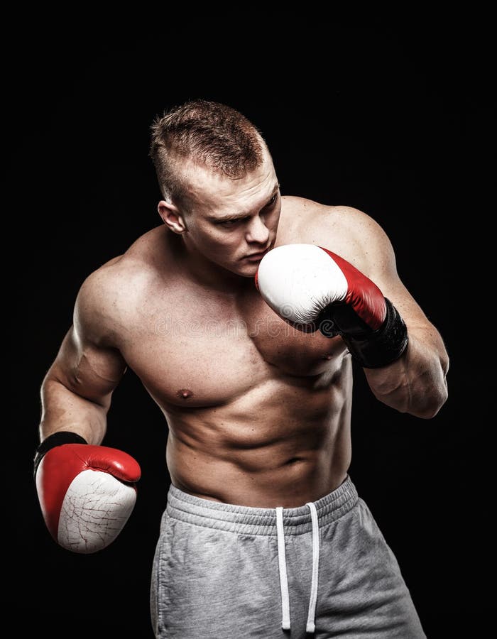 Man wearing boxing gloves stock image. Image of arts - 49694237