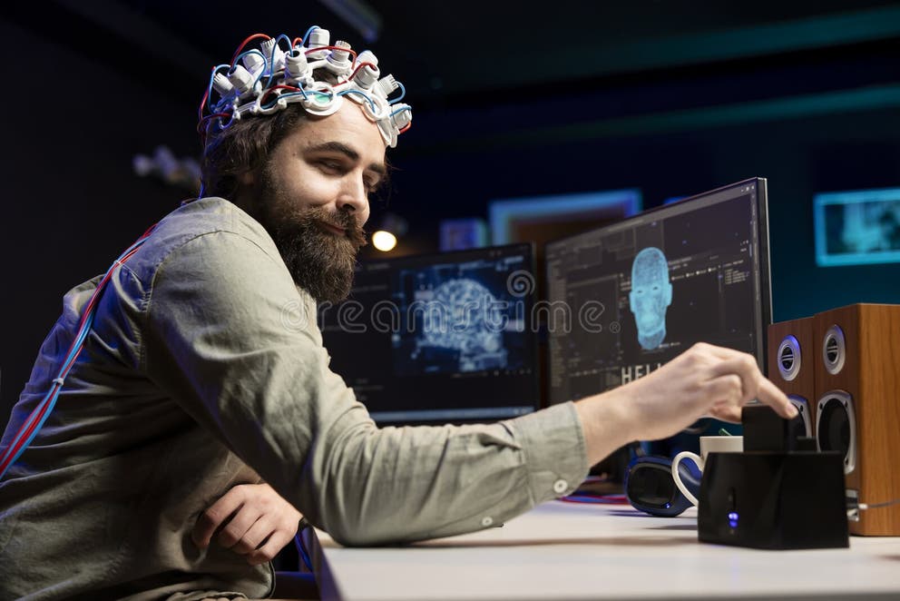 Man with EEG Headset Inserts Disk into PC Containing Software Making AI Sentient Stock Image ...