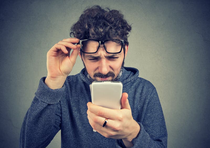 Man With Glasses Having Trouble Seeing Phone Screen Vision Problems