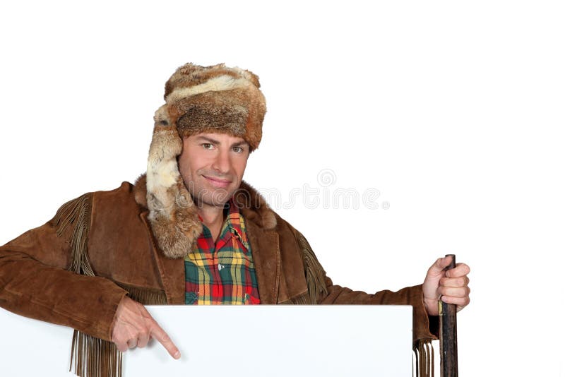 Man Wearing a Hat Pointing To a Blank Poster Stock Photo - Image of ...