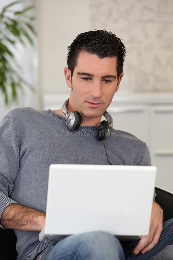 Man wearing headphones stock image. Image of lounge, serious - 35916207