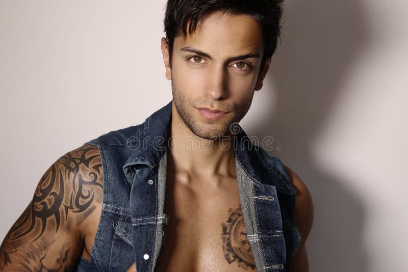 Man wearing a jeans jacket stock image. Image of jeans - 54533653