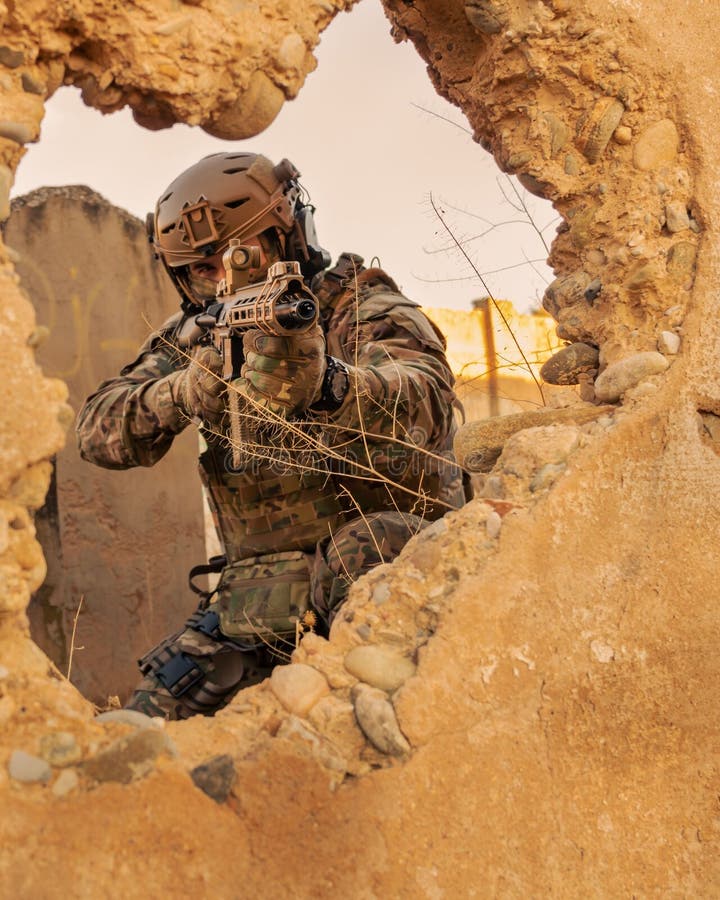 Man Wearing a Military Uniform with a Rifle Stock Image - Image of ...