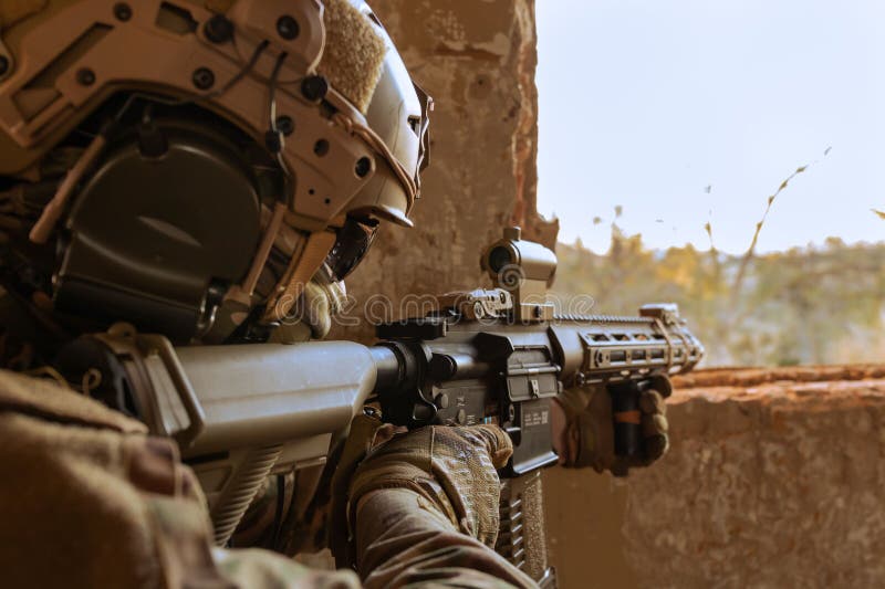 Man Wearing a Military Uniform with a Rifle Stock Photo - Image of ...