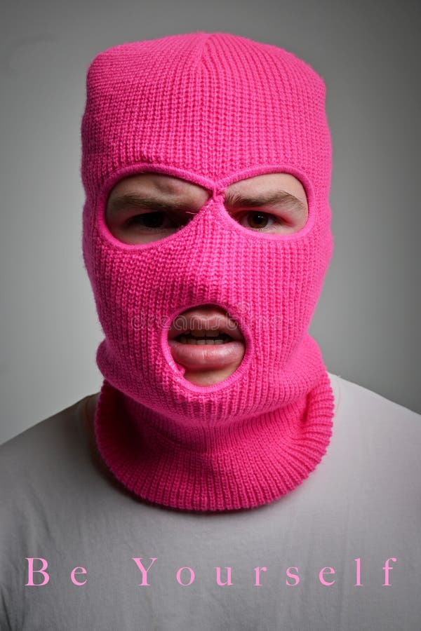 Man wearing a pink mask stock image. Image of beard - 258069109