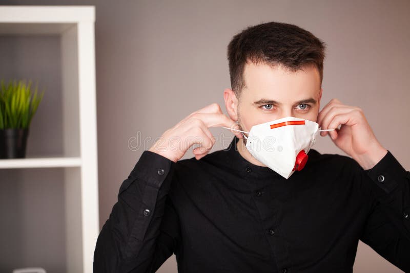 Man Wearing a Protective Mask To Protect Against the Virus Stock Photo ...