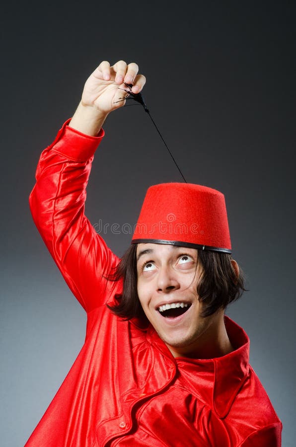 Man wearing red fez hat stock image. Image of humour - 62705109