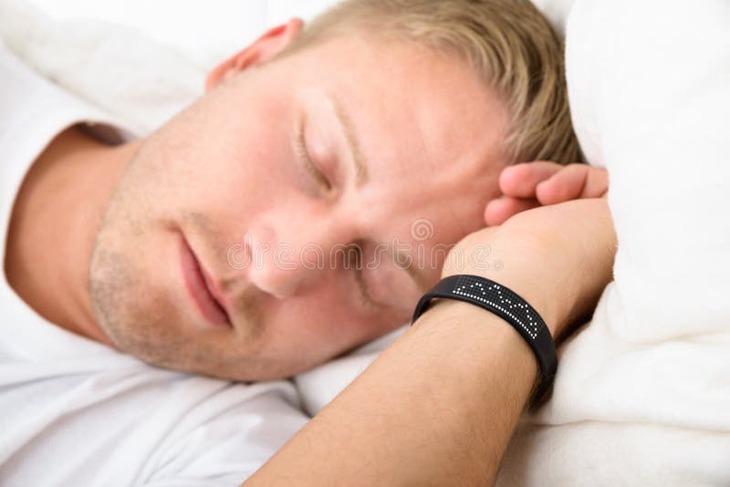 Man Sleeping with Smart Watch in His Hand Stock Image - Image of home ...