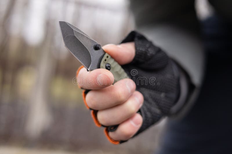 The Man Wearing Tactical Gloves Using Folding Knife Stock Image - Image ...