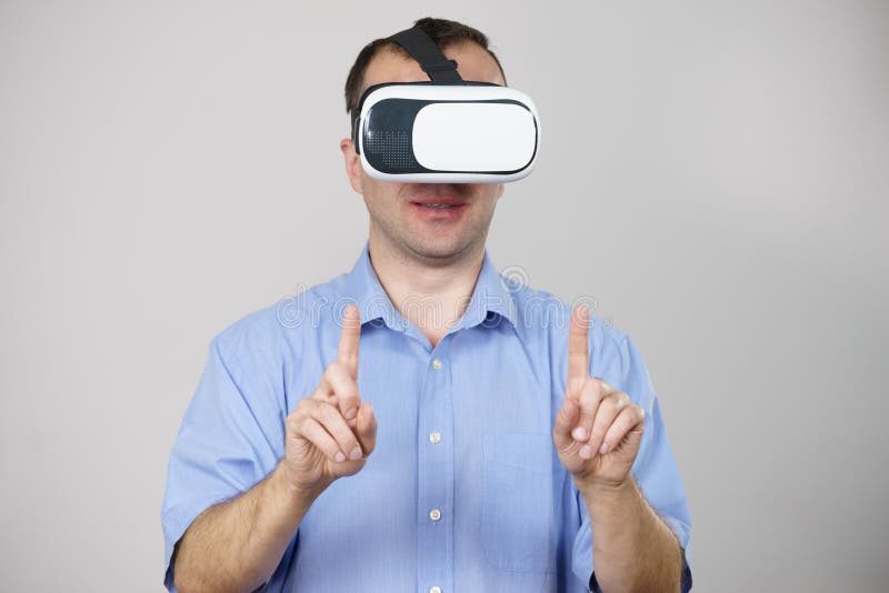 Man Wearing Virtual Reality Goggles on Grey Stock Image - Image of ...
