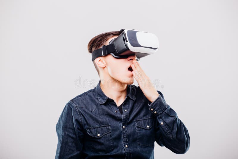 Male Playing Video Games with Virtual Reality Headset and Joystick or ...