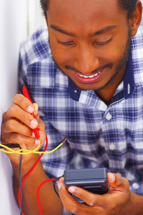Black Man Fixing Electrical Cable Stock Photos - Free & Royalty-Free ...