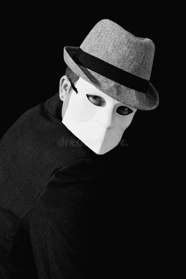 Man Wearing a Suit and White Masquerade Mask Stock Photo - Image of ...