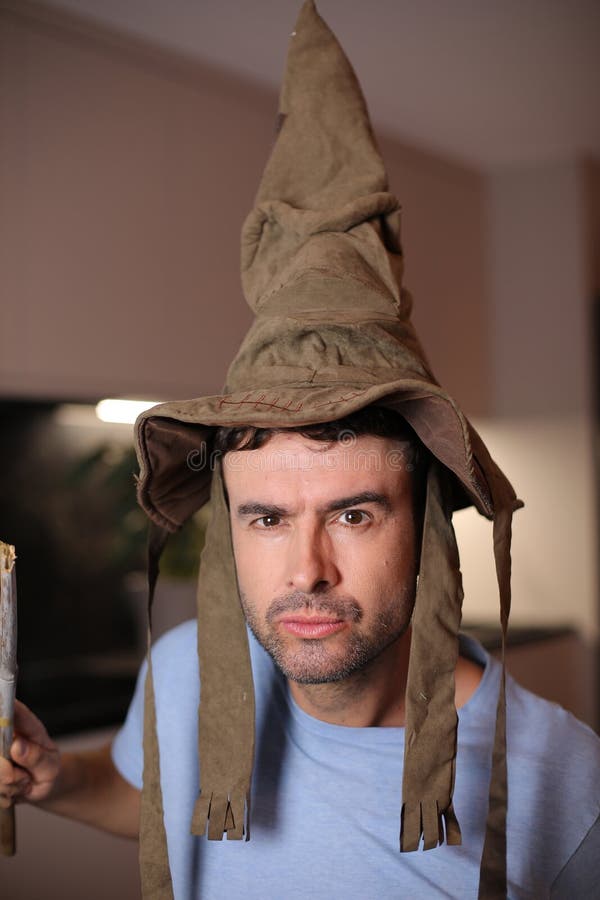 Man Wearing a Wizard Hat and Holding a Magic Wand Stock Image - Image ...