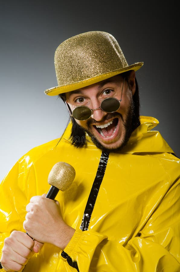 Man wearing yellow suit stock photo. Image of recording - 58139190