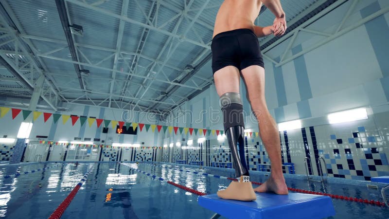 Disabled Swimmer with Prosthetic Leg, Back View. Stock Video - Video of ...