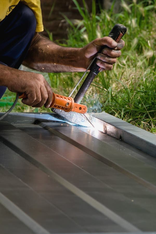 Arc Welding Door Jam stock photo. Image of laboring, flame - 7316784