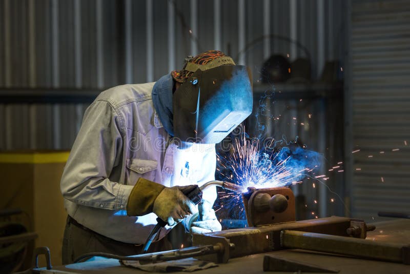 Man or Welder Welding in Shop Stock Image - Image of heat, shop: 127635973