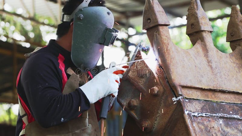 The Man is Welding. Welding with Argon or Electrode, Using a Welding ...