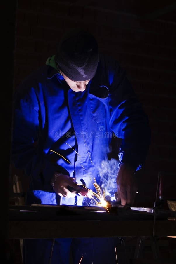 Man welding with mask stock photo. Image of industrial - 9420062