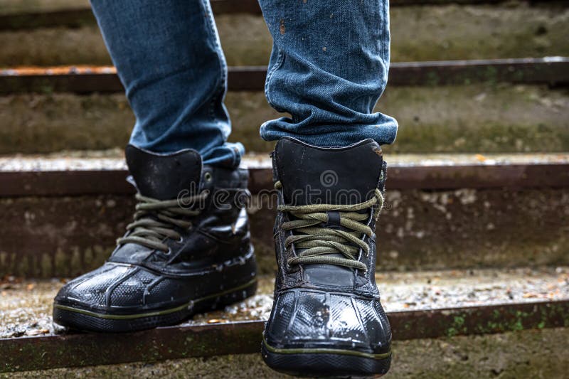A Man in Boots on the Old Steps, Close-up. Stock Photo - Image of road ...