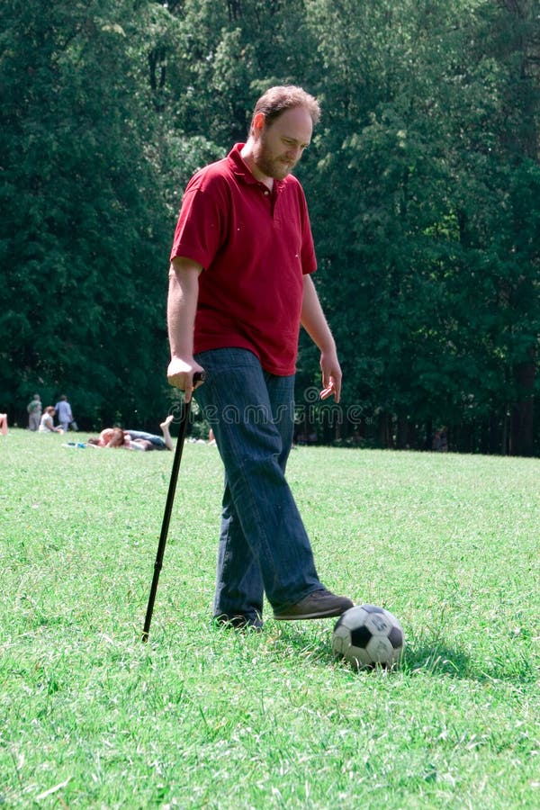 Man-wheel with a stick stock photo. Image of nature, grass - 14051708