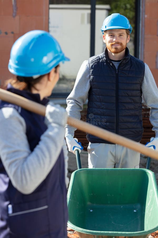 Man with Wheelbarrow at Construction Site Stock Image - Image of person ...