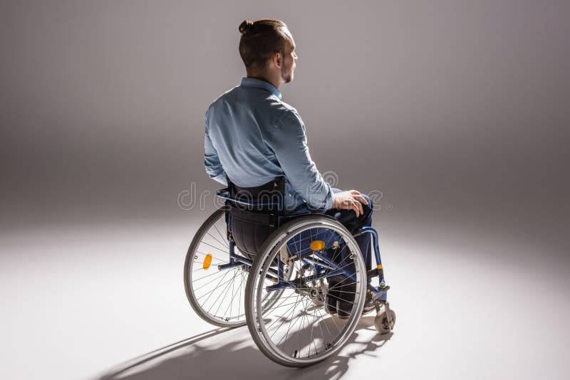 Man on Wheelchair Casting Shadow Stock Image - Image of wheelchair ...
