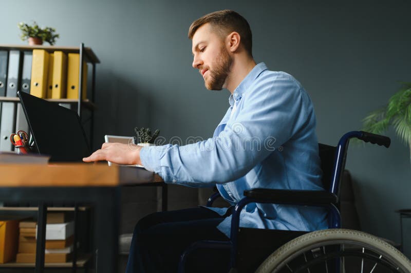 Man in Wheelchair at Home or in Office Stock Photo - Image of sitting ...