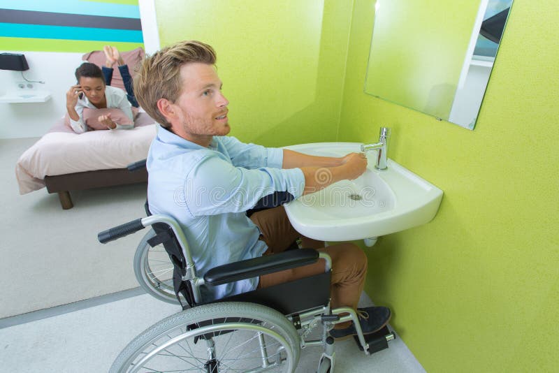Man on Wheelchair Washing Hands Stock Photo - Image of handicapped ...