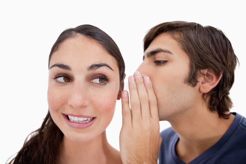 A Guy Whispering Something To a Girl Stock Image - Image of shirt ...