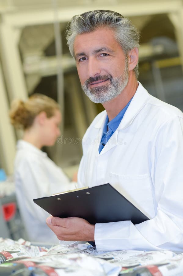 Man in white coat stock photo. Image of colleague, report - 265339840