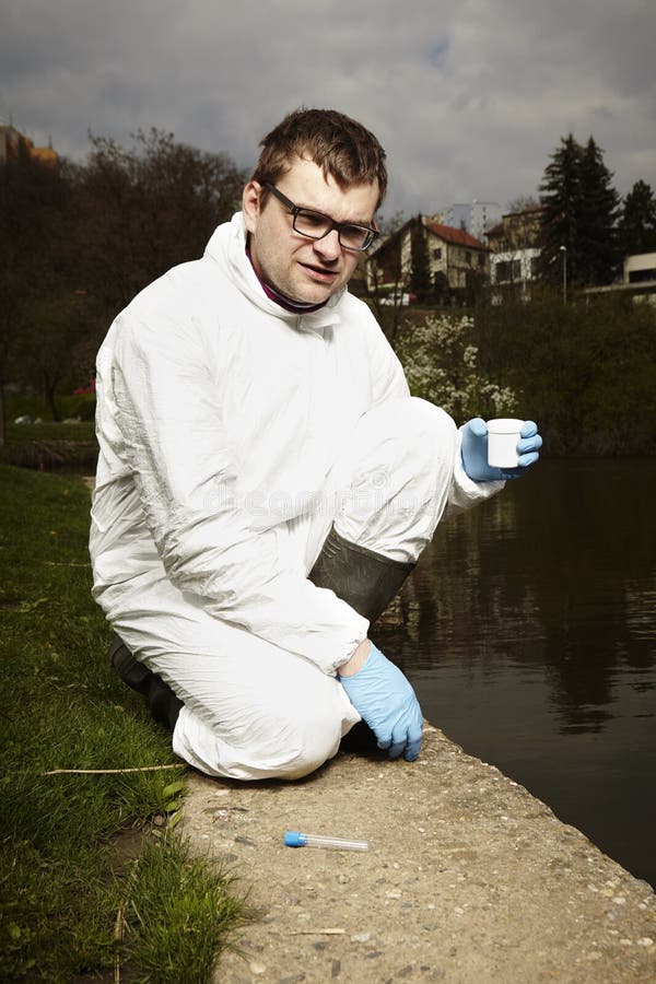 Man in White Overall Collecting of Water Sample Stock Photo - Image of ...