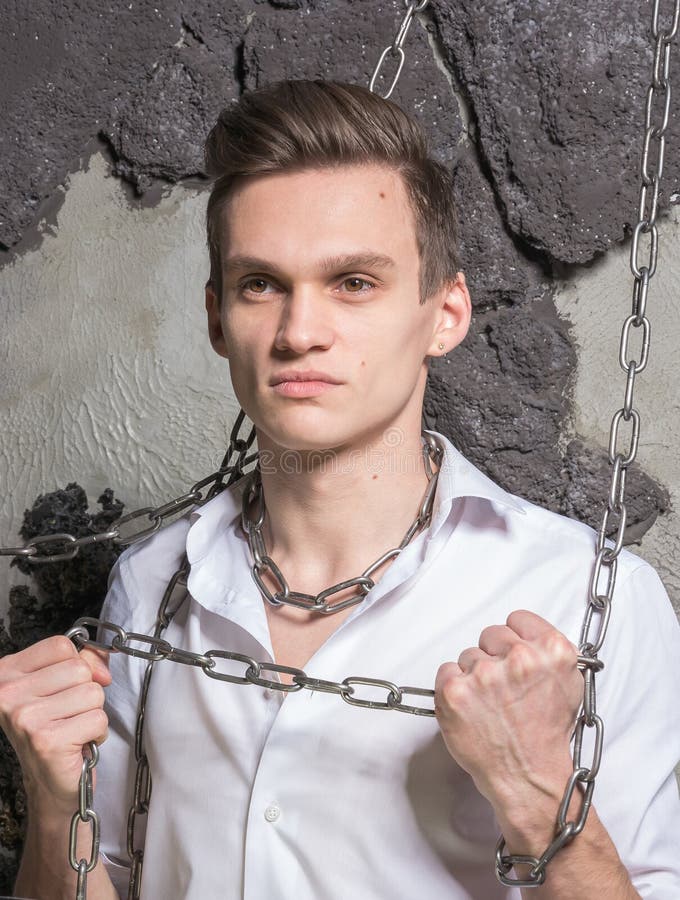 A Man in a White Shirt and Tie Breaks the Chain. Stock Image - Image of ...