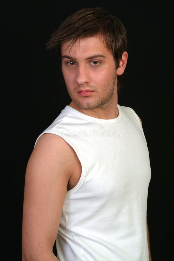 Man in White Vest #1 stock photo. Image of muscular, clothing - 71100