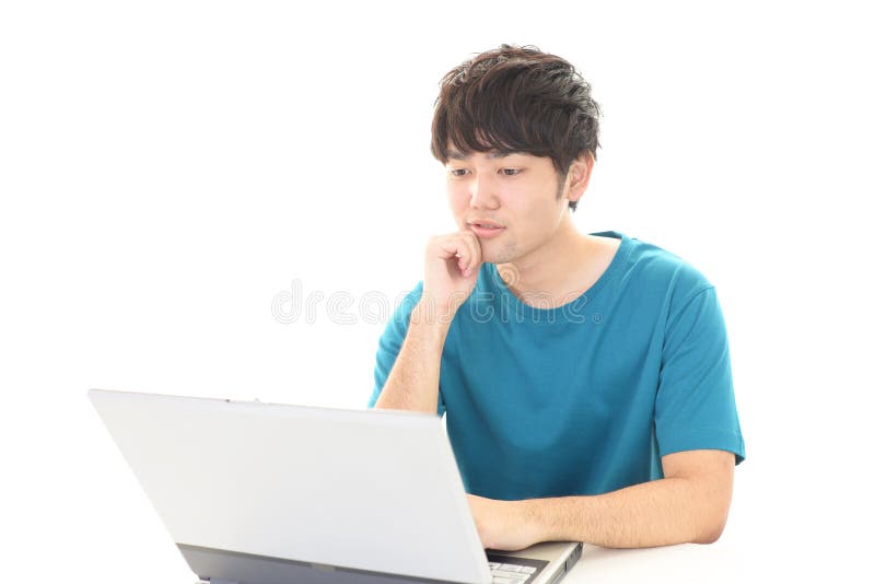 Asian man using a laptop stock image. Image of male - 126088617