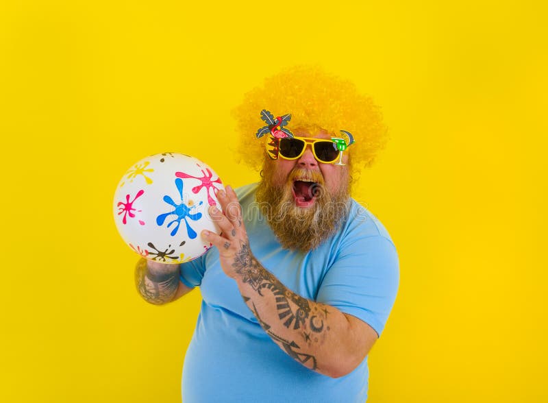 Fat Man with Wig in Head and Sunglasses Have Fun with a Ball Stock ...