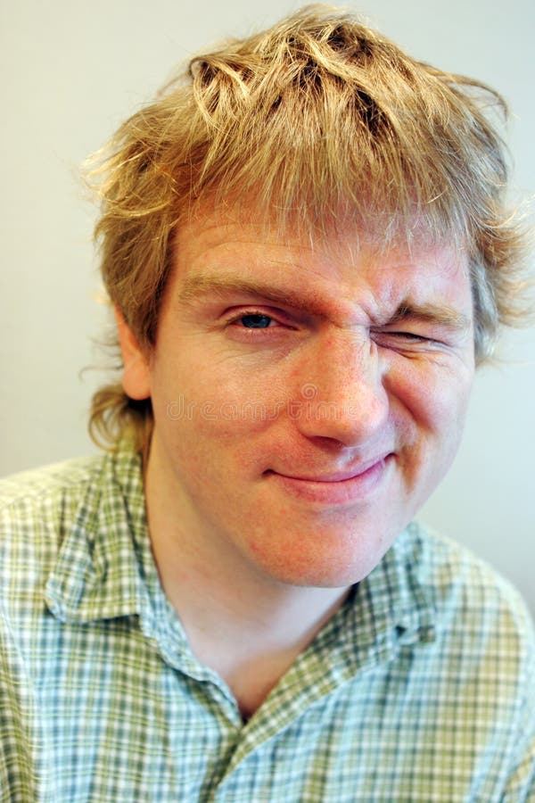 Man winking stock photo. Image of smile, comical, wink - 2491374